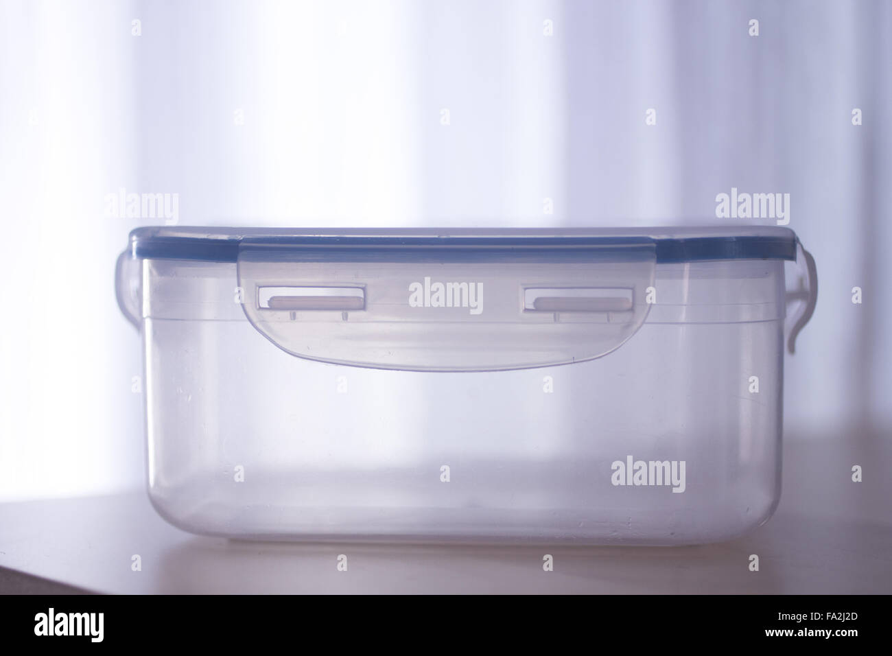 Kitchen food storage transparent plastic container Stock Photo - Alamy