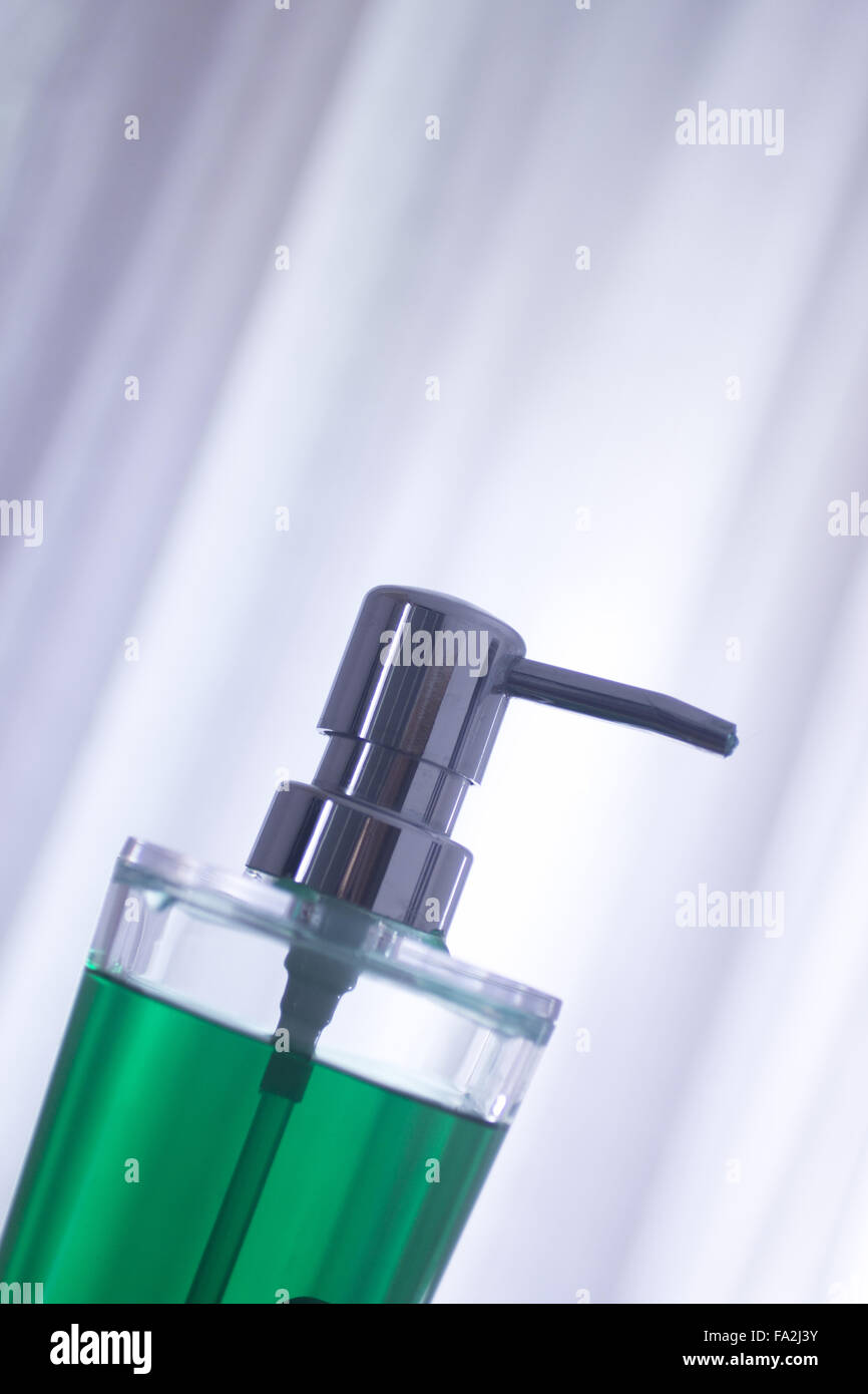 Hand soap hygiene liquid dispenser for washing hands Stock Photo - Alamy
