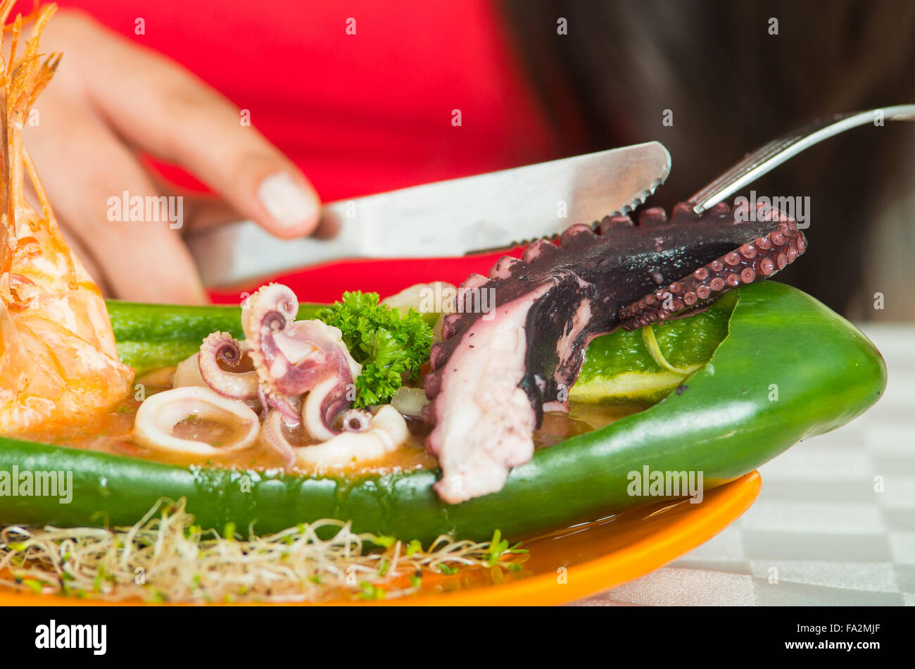 Exotic seafood dish with shrimp, calamari and octopus Stock Photo - Alamy