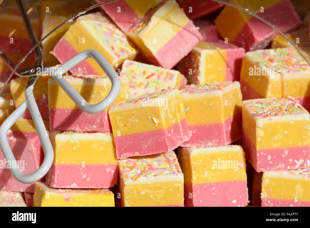 Bright colorful fudge for sale at market stall during food festival in ...