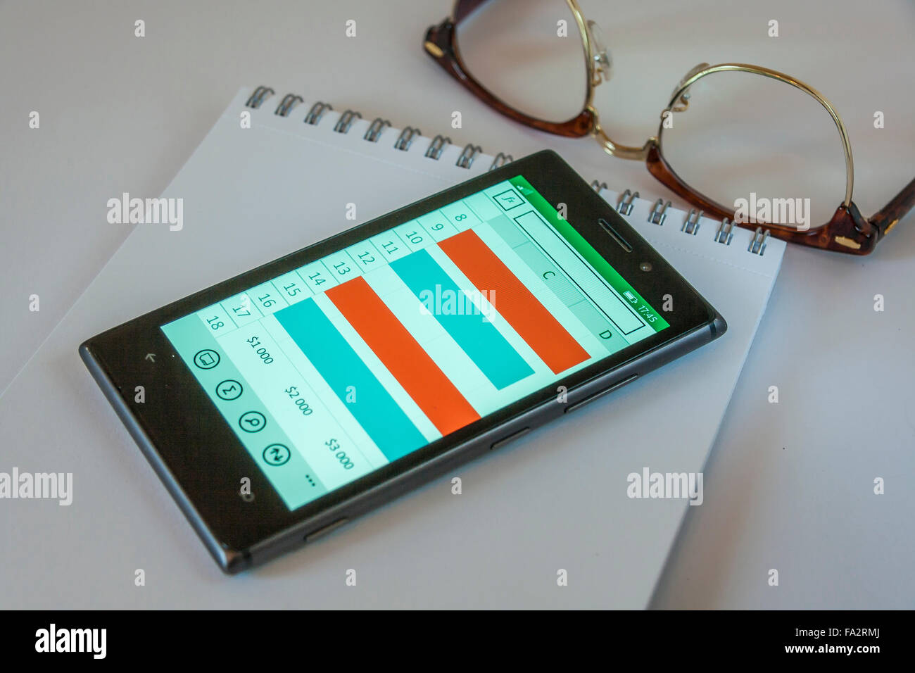 Notepad, Mobile Phone, And Glasses Stock Photo - Alamy