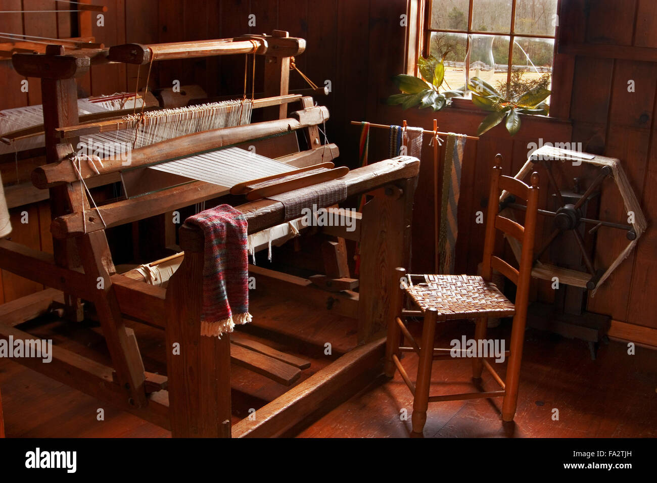 An old loom for weaving cloth sets in an old cabin at the Chief Van ...