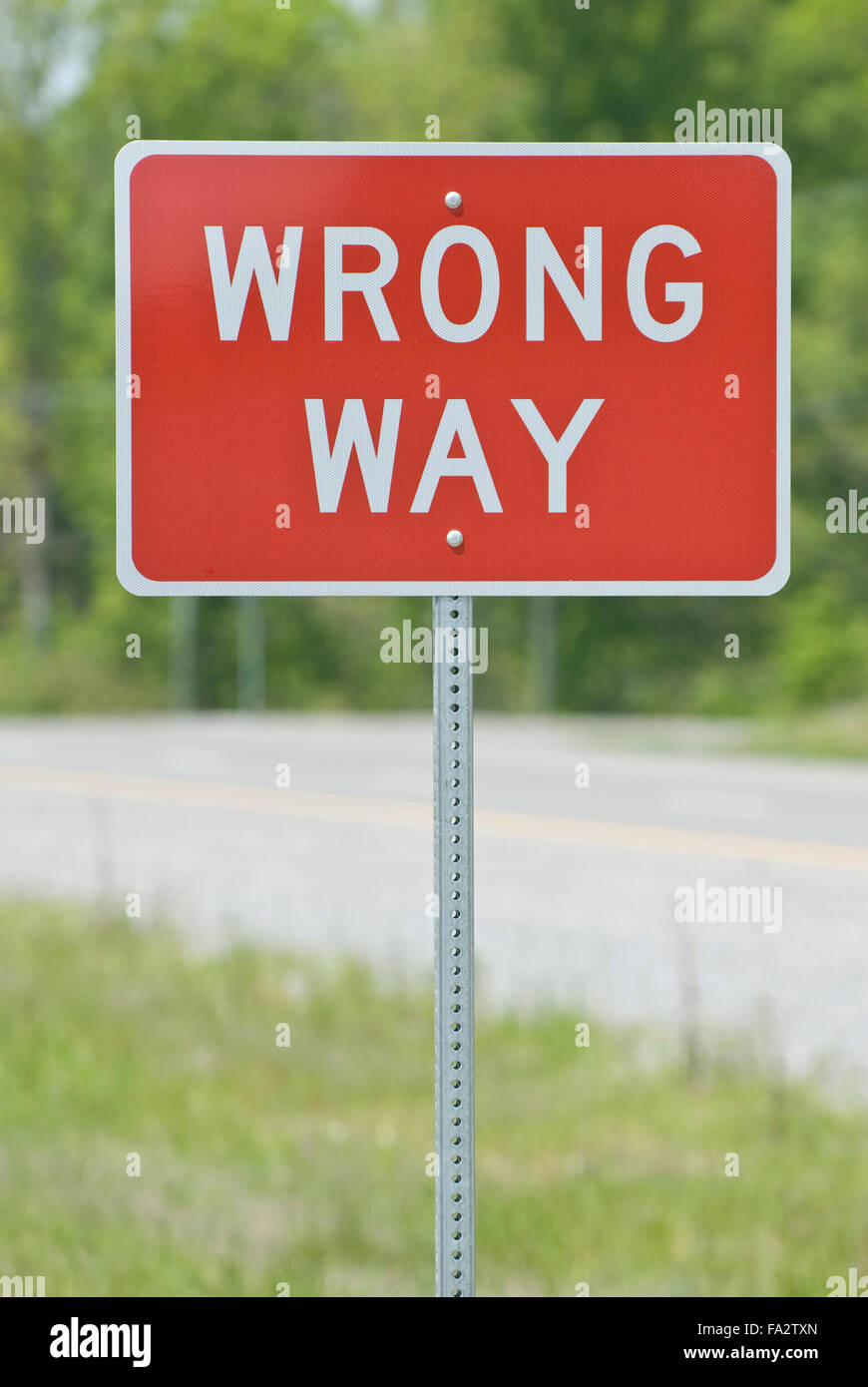 Wrong Way Sign Stock Photo - Alamy