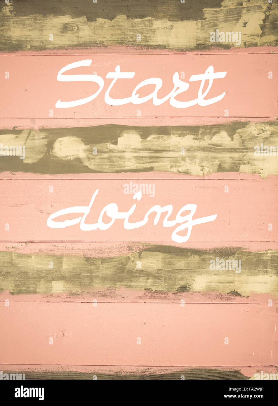 Concept image of Start Doing motivational quote hand written on vintage ...