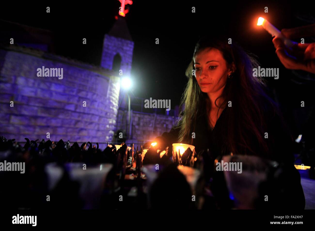 Amman. 21st Dec, 2015. Jordanian Christians attend a mass pray and ...