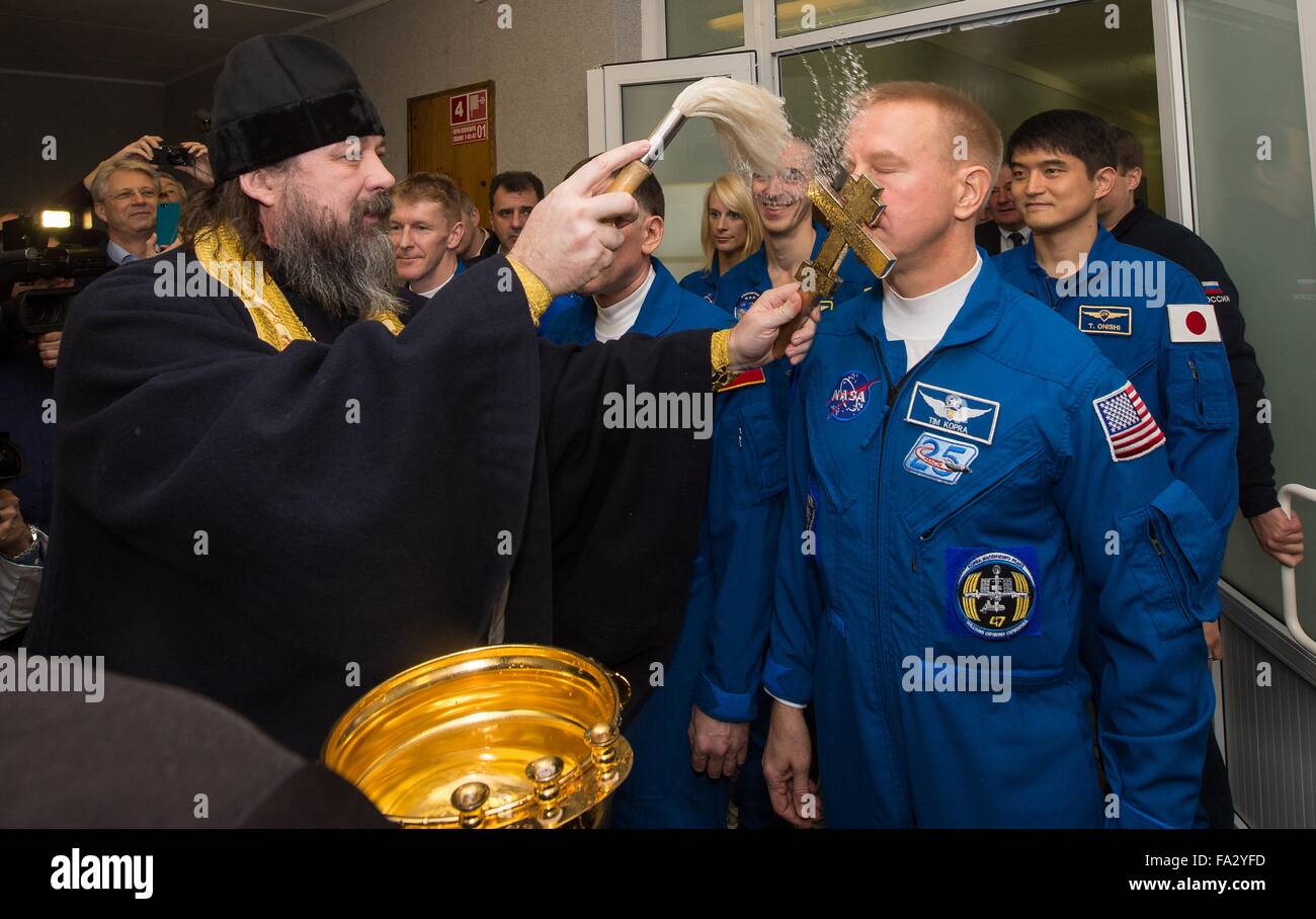 A Russian Orthodox priest blesses Expedition 46 Flight Engineer Tim ...