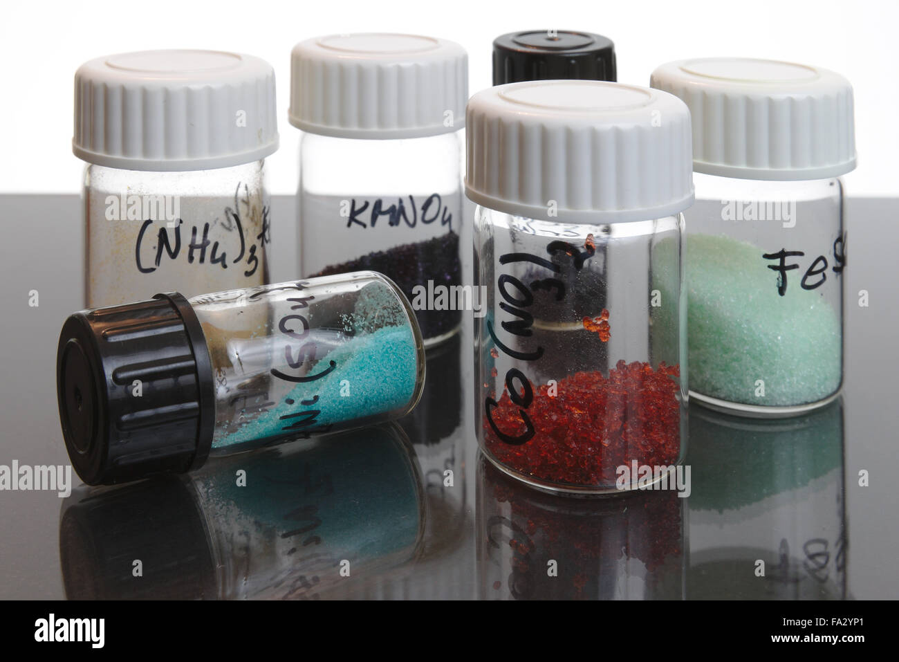 Labeled bottles with inorganic salts Stock Photo - Alamy