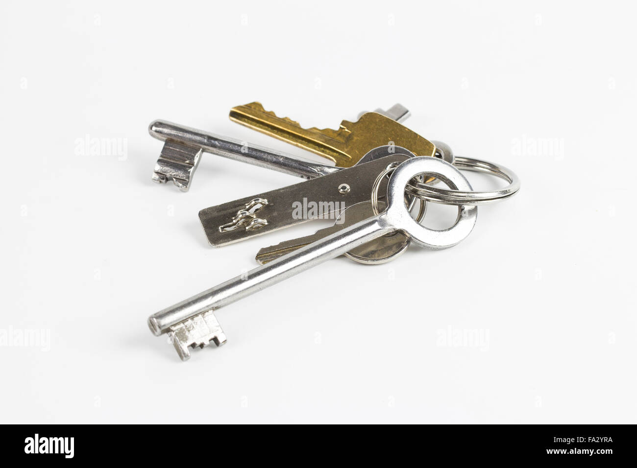 Six keys of different kind photographed on white background Stock Photo ...