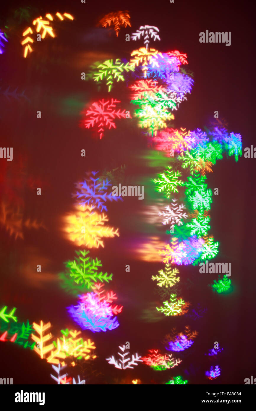 high quality snowflake light leak.. on dark background Stock Photo - Alamy