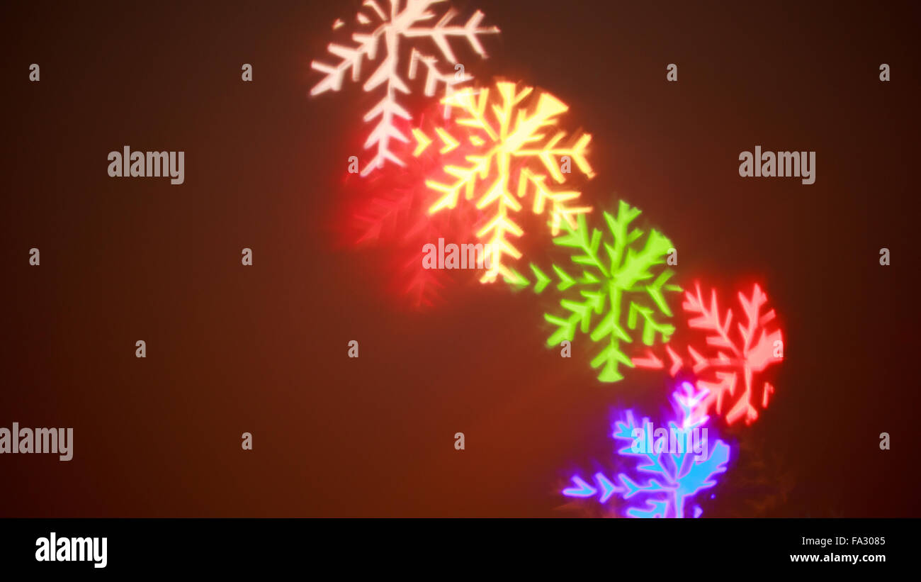 high quality snowflake light leak.. on dark background Stock Photo - Alamy
