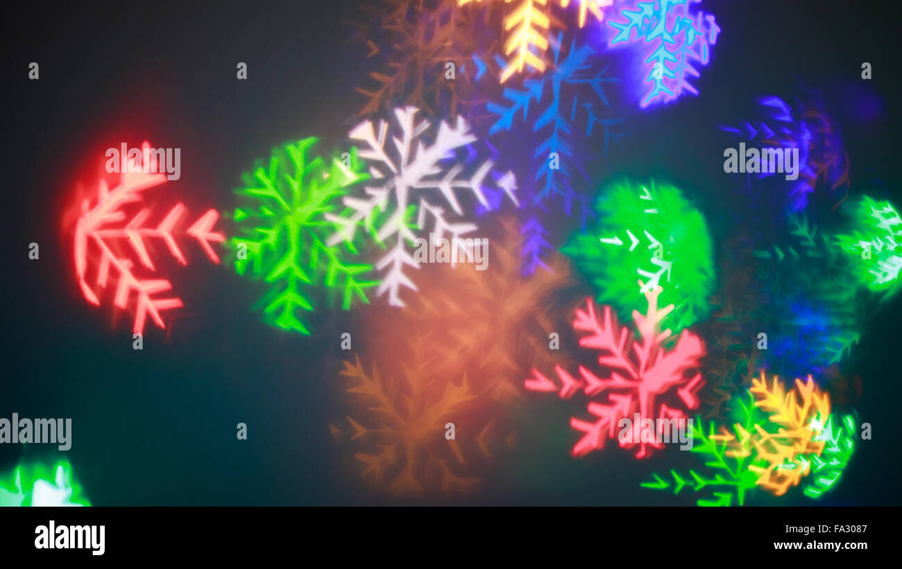 high quality snowflake light leak.. on dark background Stock Photo - Alamy