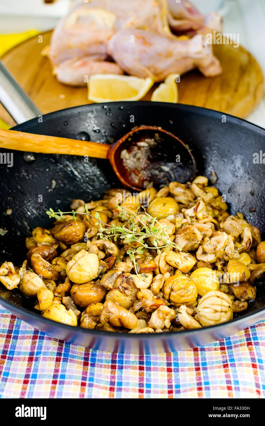 Pan-fried chestnuts with mushrooms and spices Stock Photo - Alamy