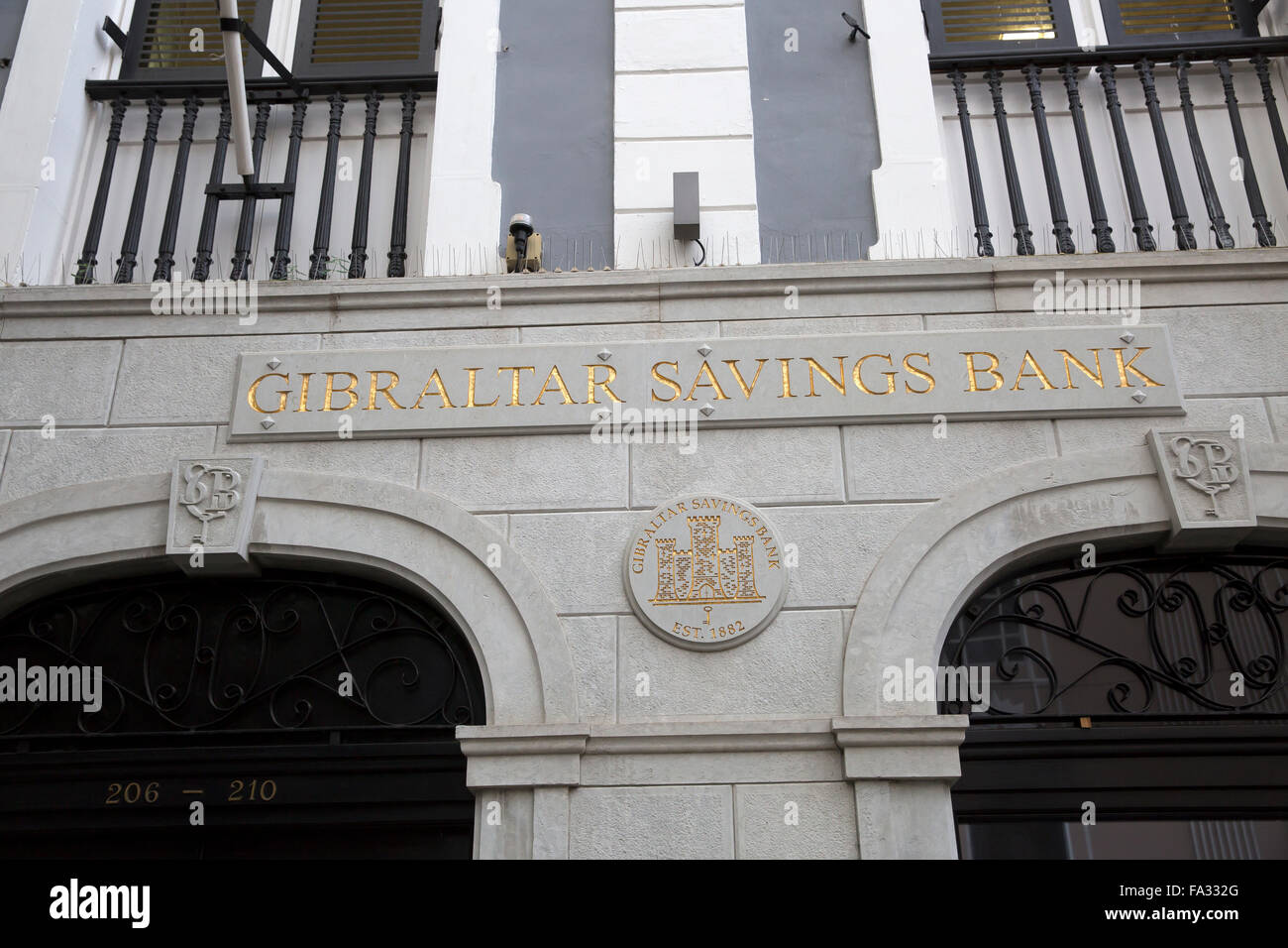 Gibraltar savings bank sign and crest Stock Photo - Alamy
