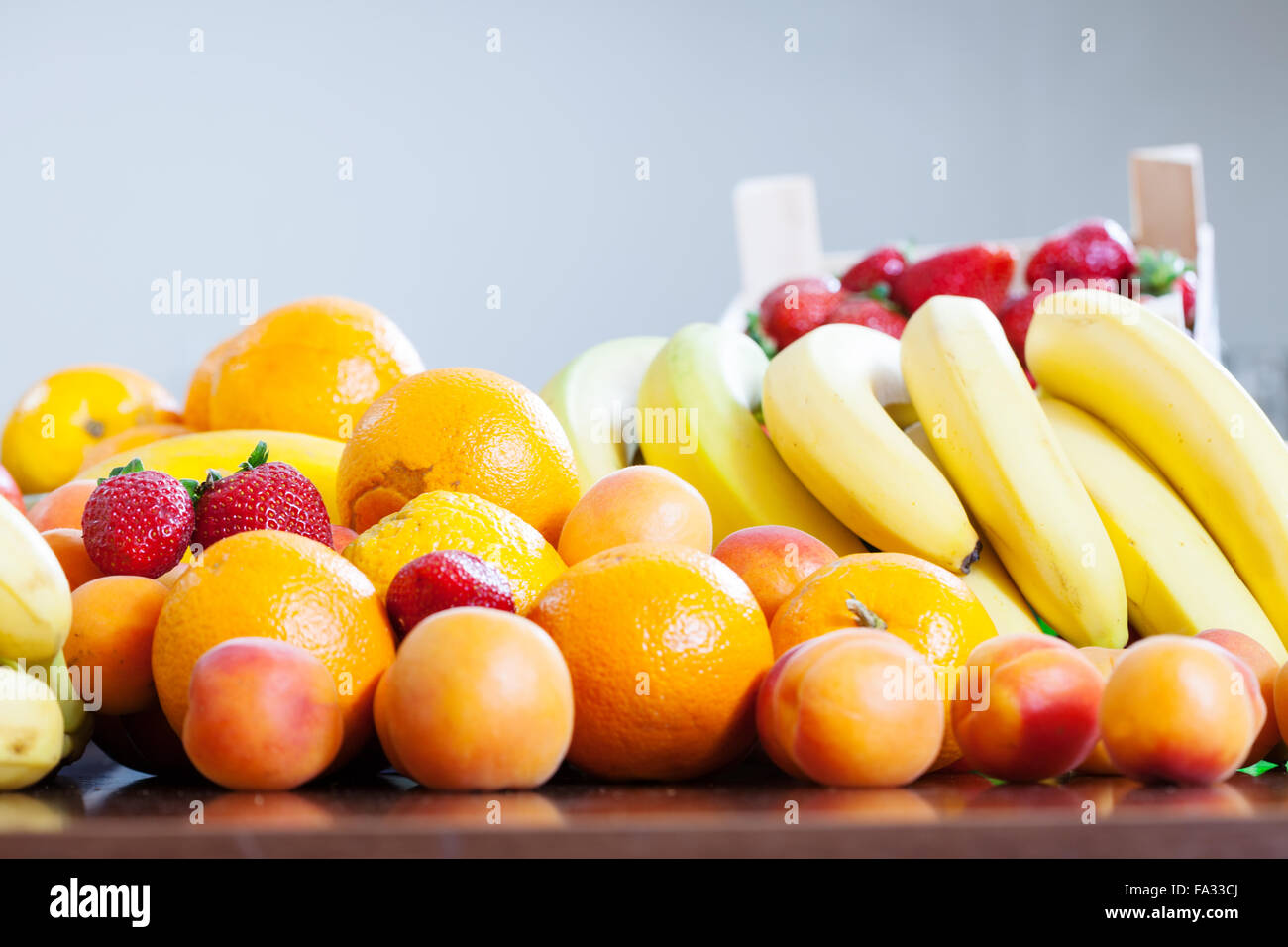 various fruits at table in kitchen at home Stock Photo - Alamy
