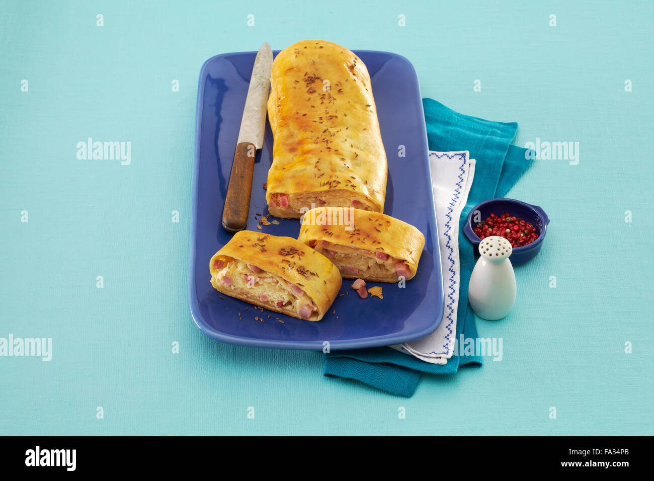 Potato roll (strudel) with sauerkraut Stock Photo - Alamy