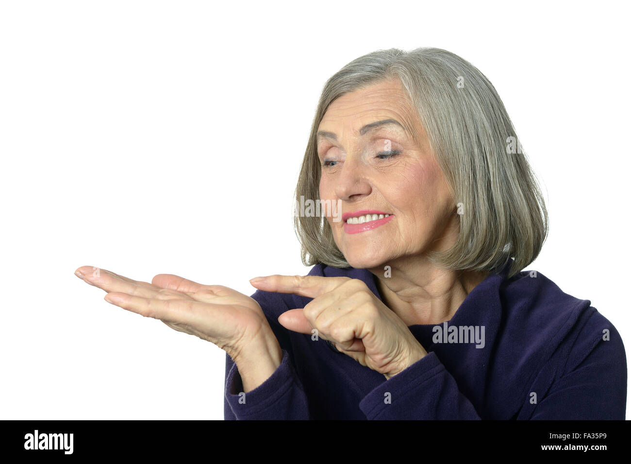 Senior woman pointing Stock Photo - Alamy