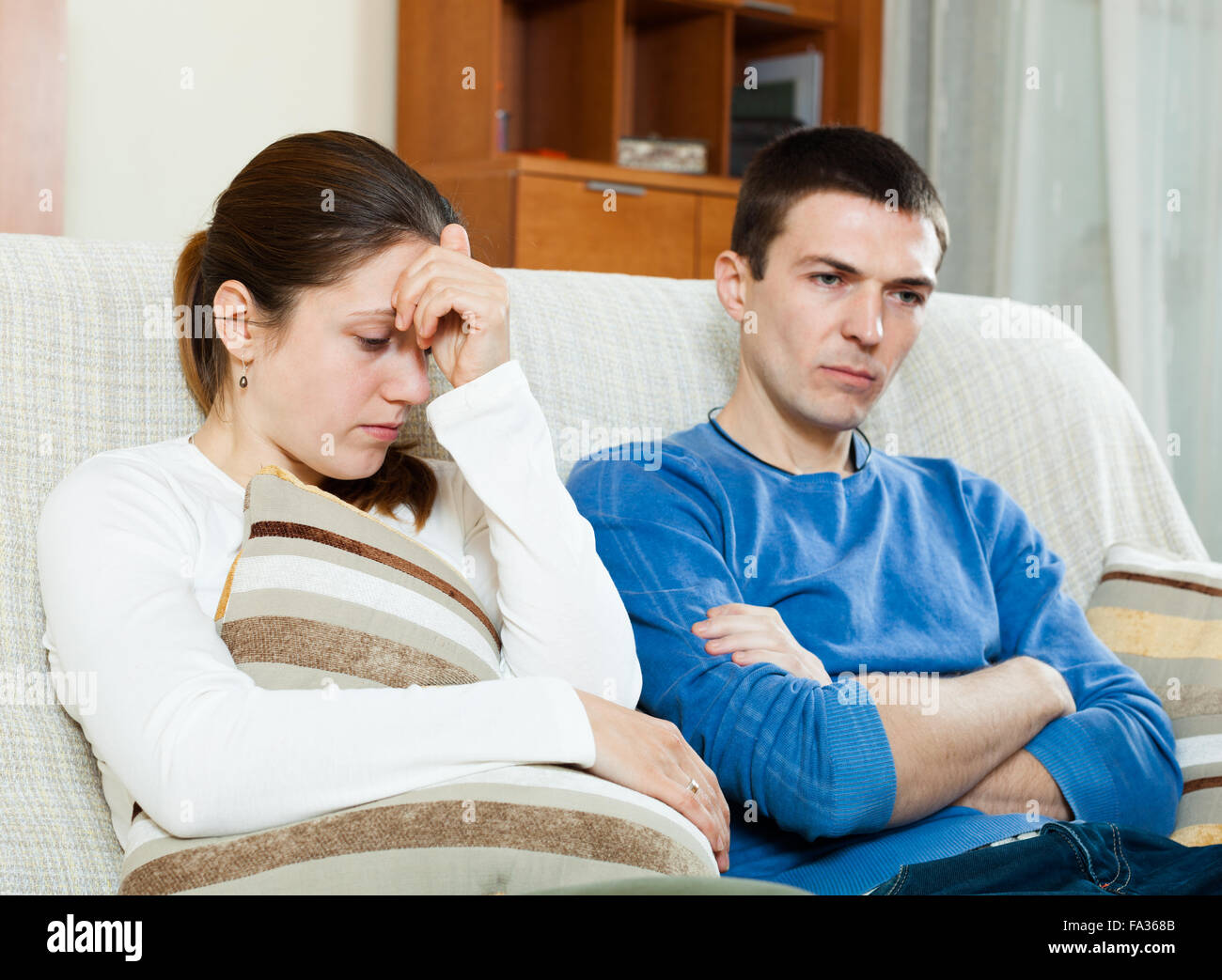 Sadness married couple having problems at home Stock Photo - Alamy