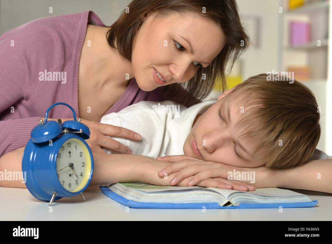Mother and son doing homework Stock Photo - Alamy