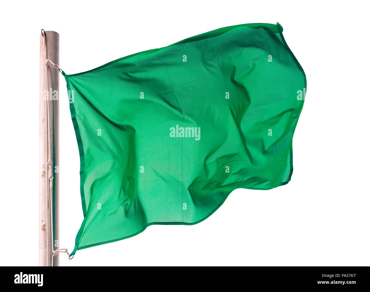 waving green flag. Isolated over white background Stock Photo - Alamy