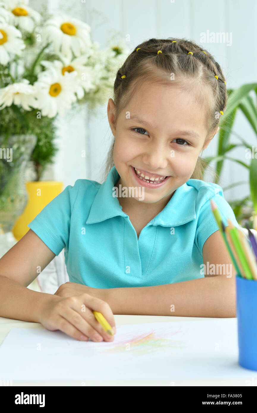Little girl drawing at home Stock Photo - Alamy