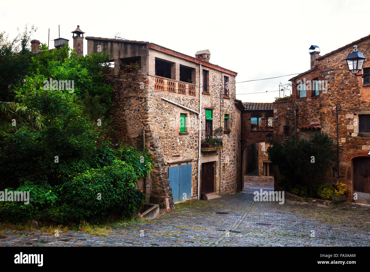 Old picturesque houses in Catalan village. Pubol, Spain Stock Photo - Alamy