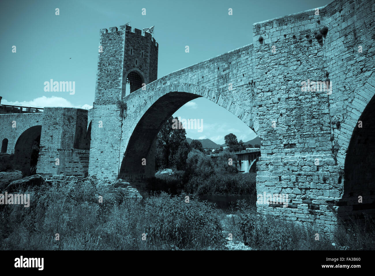 Vintage photo Medieval stone bridge wit gate Stock Photo - Alamy