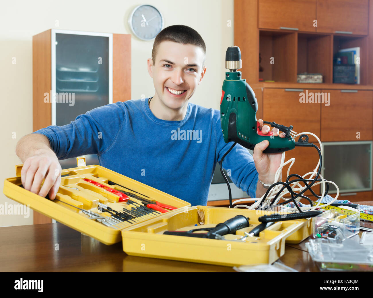 guy doing something with working tools Stock Photo - Alamy