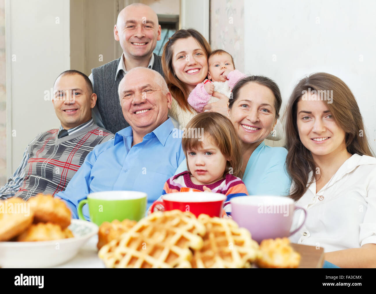 happy three generations family communicate over tea Stock Photo - Alamy