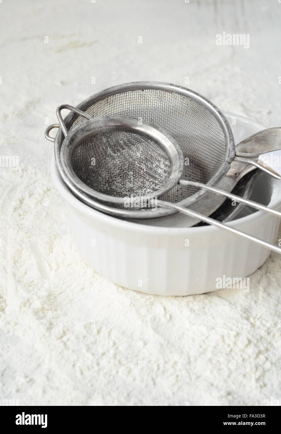 Kitchen utensils and wheat flour on the table Stock Photo - Alamy