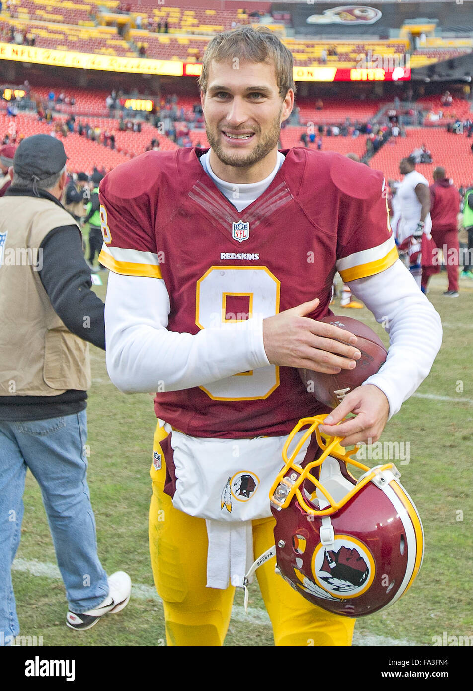 Washington Redskins quarterback Kirk Cousins (8) smiles as he leaves ...