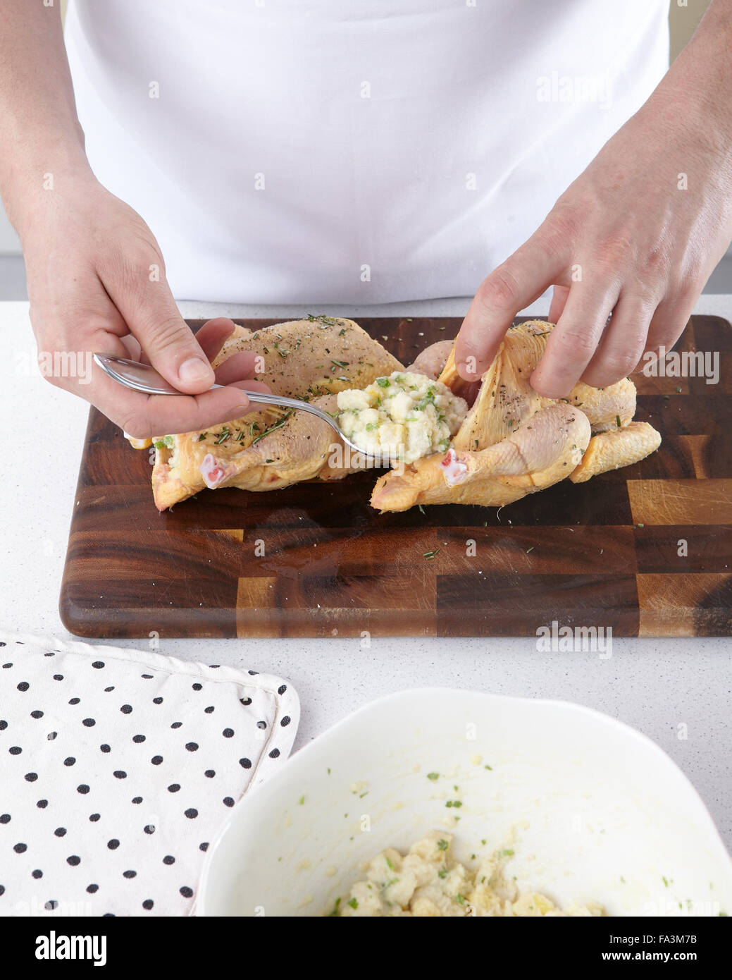 Stuffed spring chicken + steps Stock Photo - Alamy