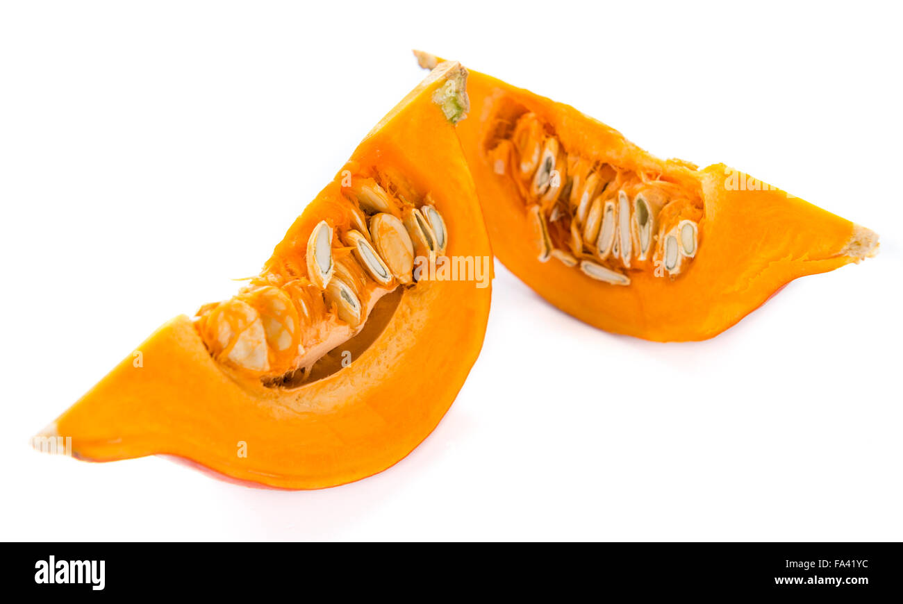 Portion of fresh Pumpkin isolated on white background (close-up shot ...