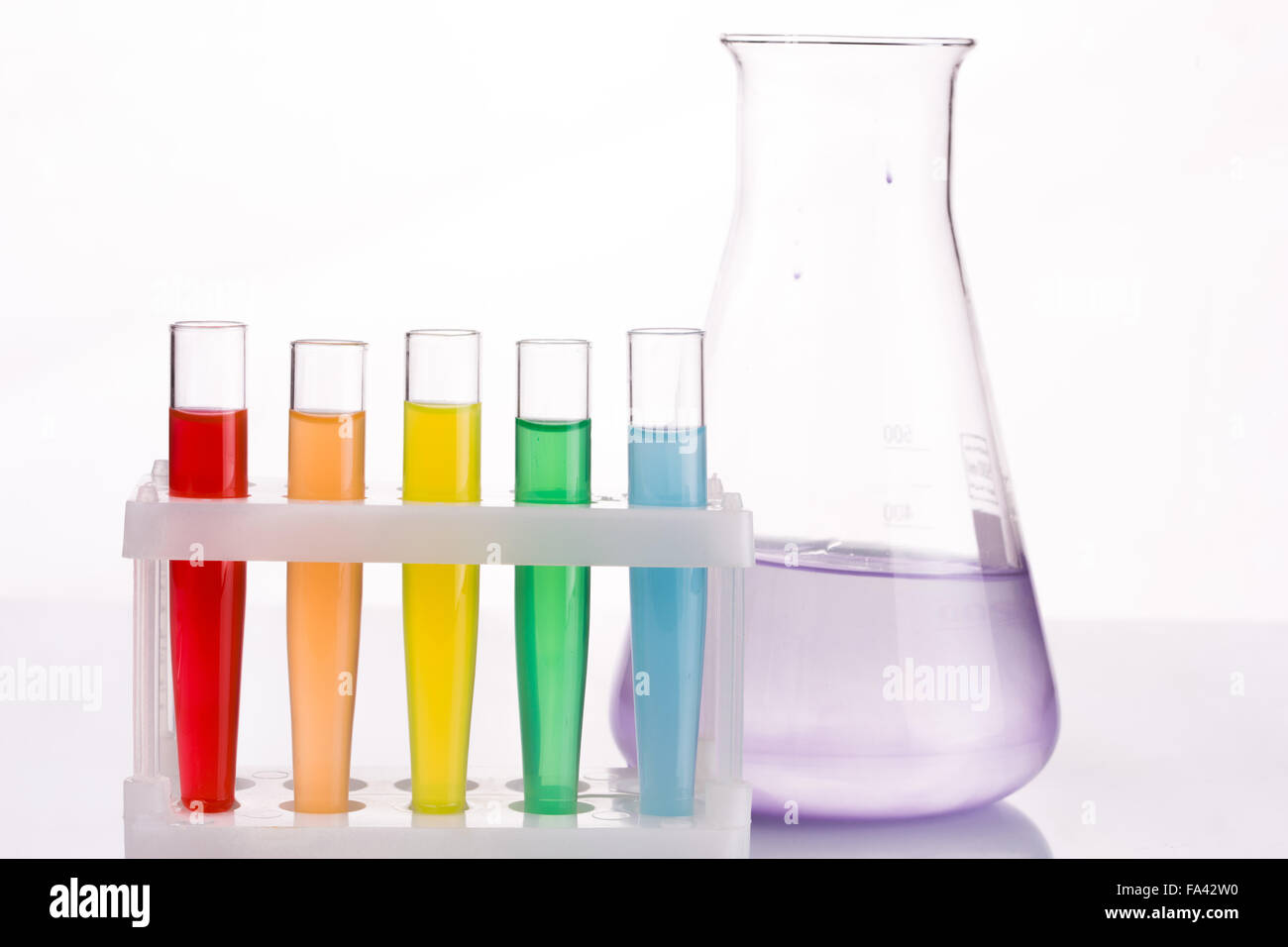 Multicolored liquid chemical tubes Stock Photo - Alamy