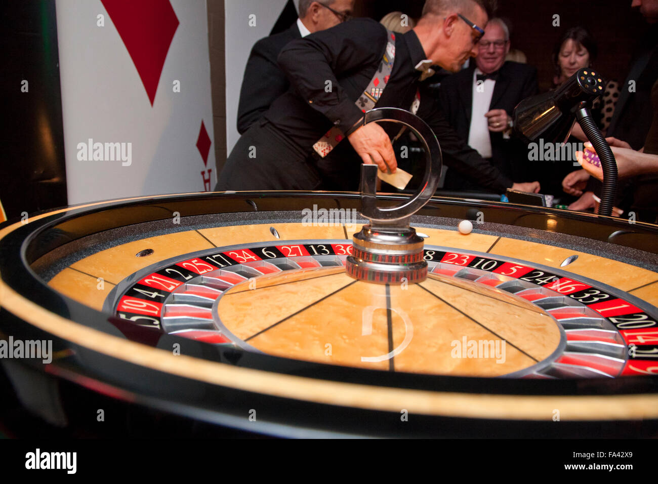 Roulette wheel in play during private casino-themed party event Stock ...