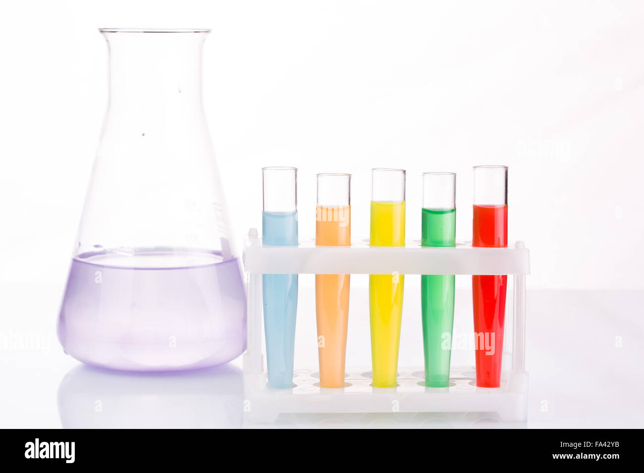 Multicolored liquid chemical tubes Stock Photo - Alamy
