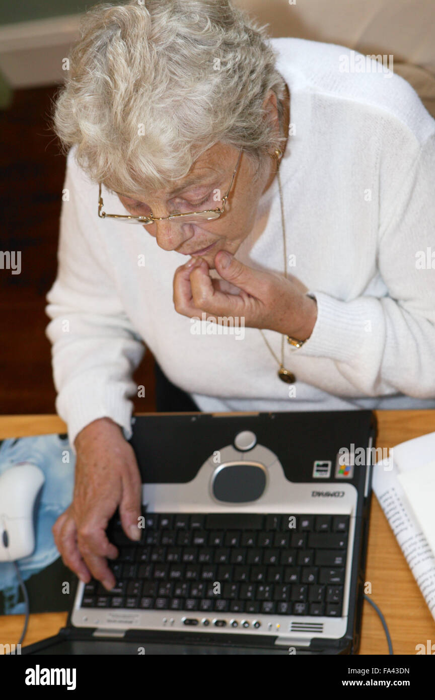 Woman at an over 60s computer training class; the Sybil Levin Centre ...