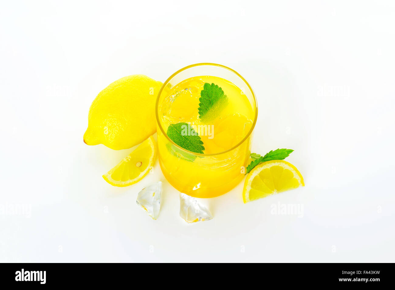 Glass of fresh lemon juice drink with ice Stock Photo - Alamy
