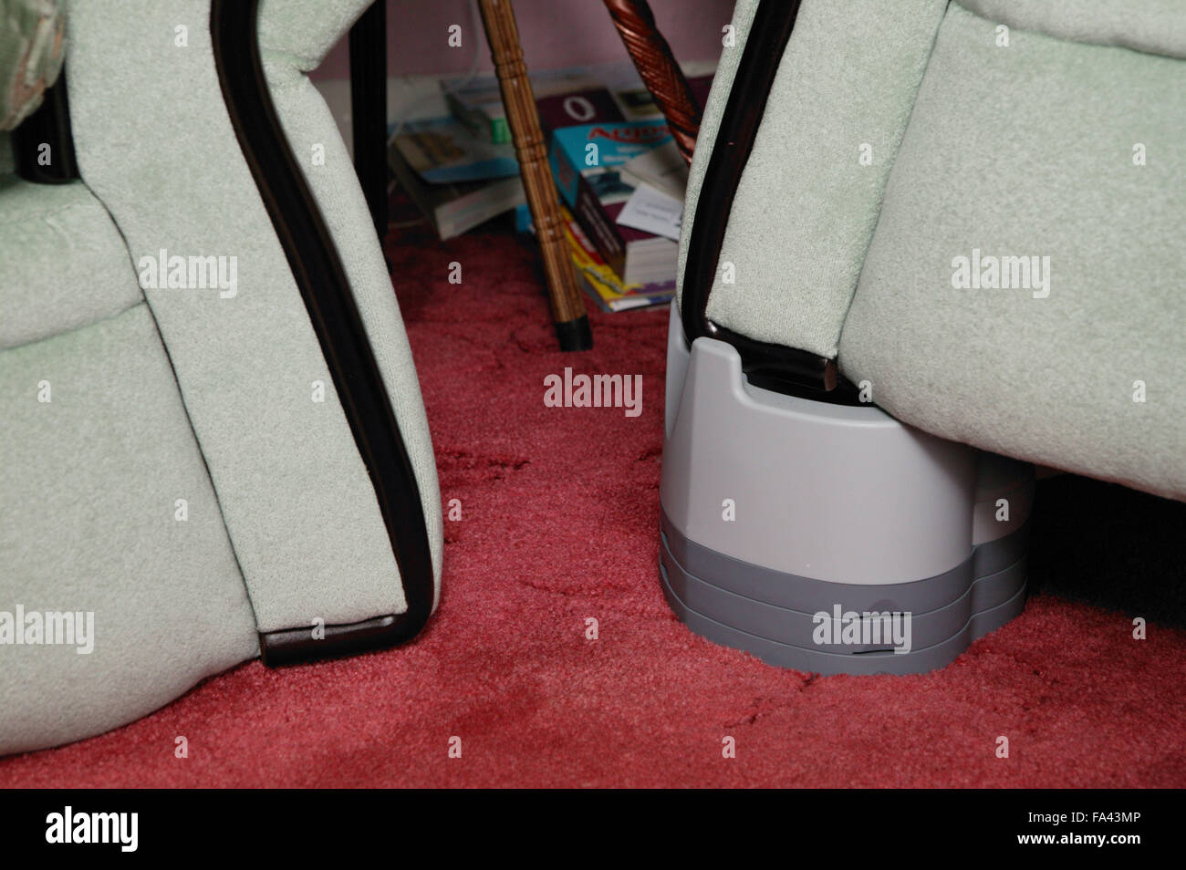 Close up of chair raising block used to make it easier for a person to ...