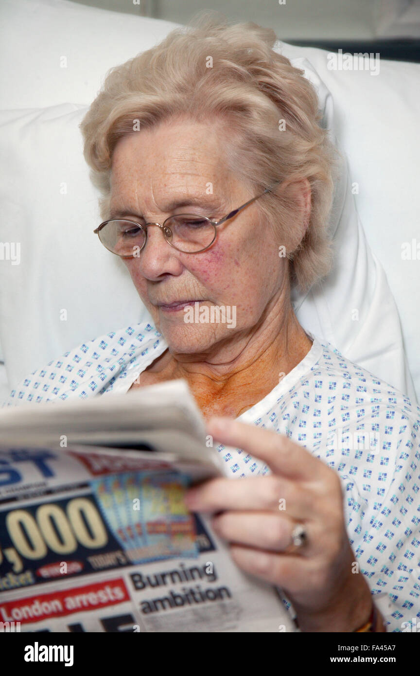 Portrait of patient reading on Cardiology Ward Stock Photo - Alamy