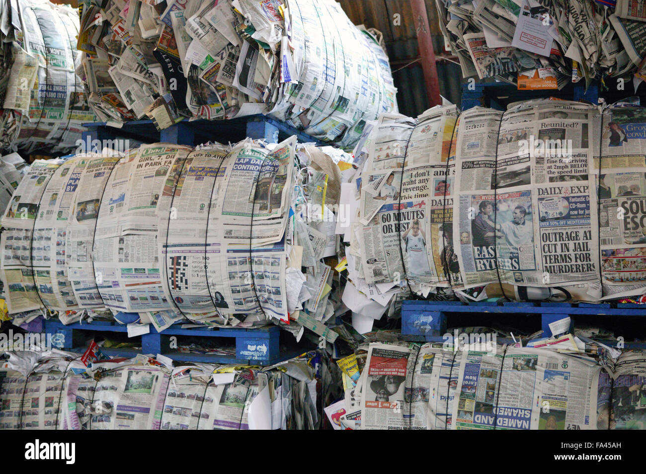 Stacks of newspaper at Ollerton recycling plant Stock Photo - Alamy
