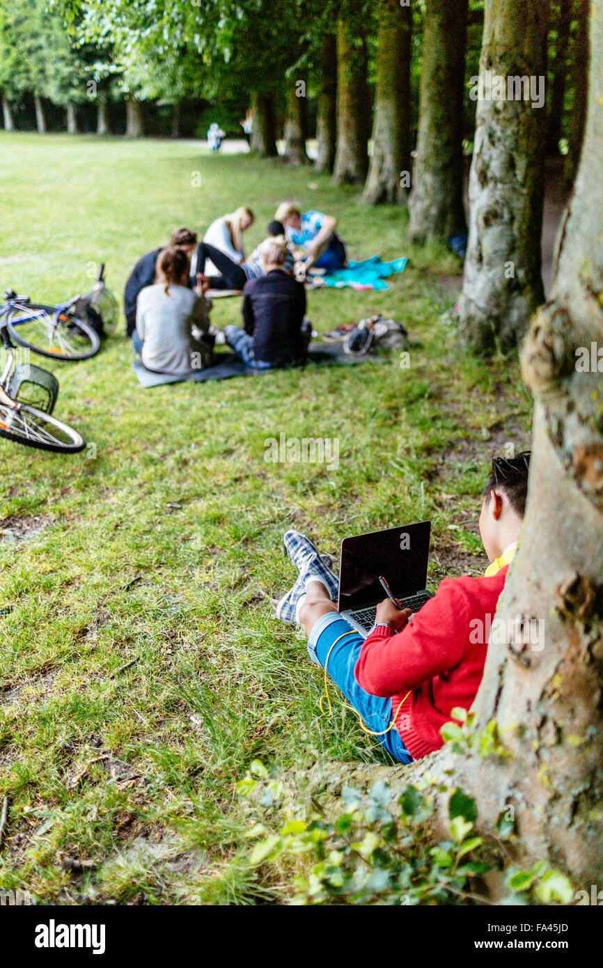 Group People Sitting Under Tree High Resolution Stock Photography and ...