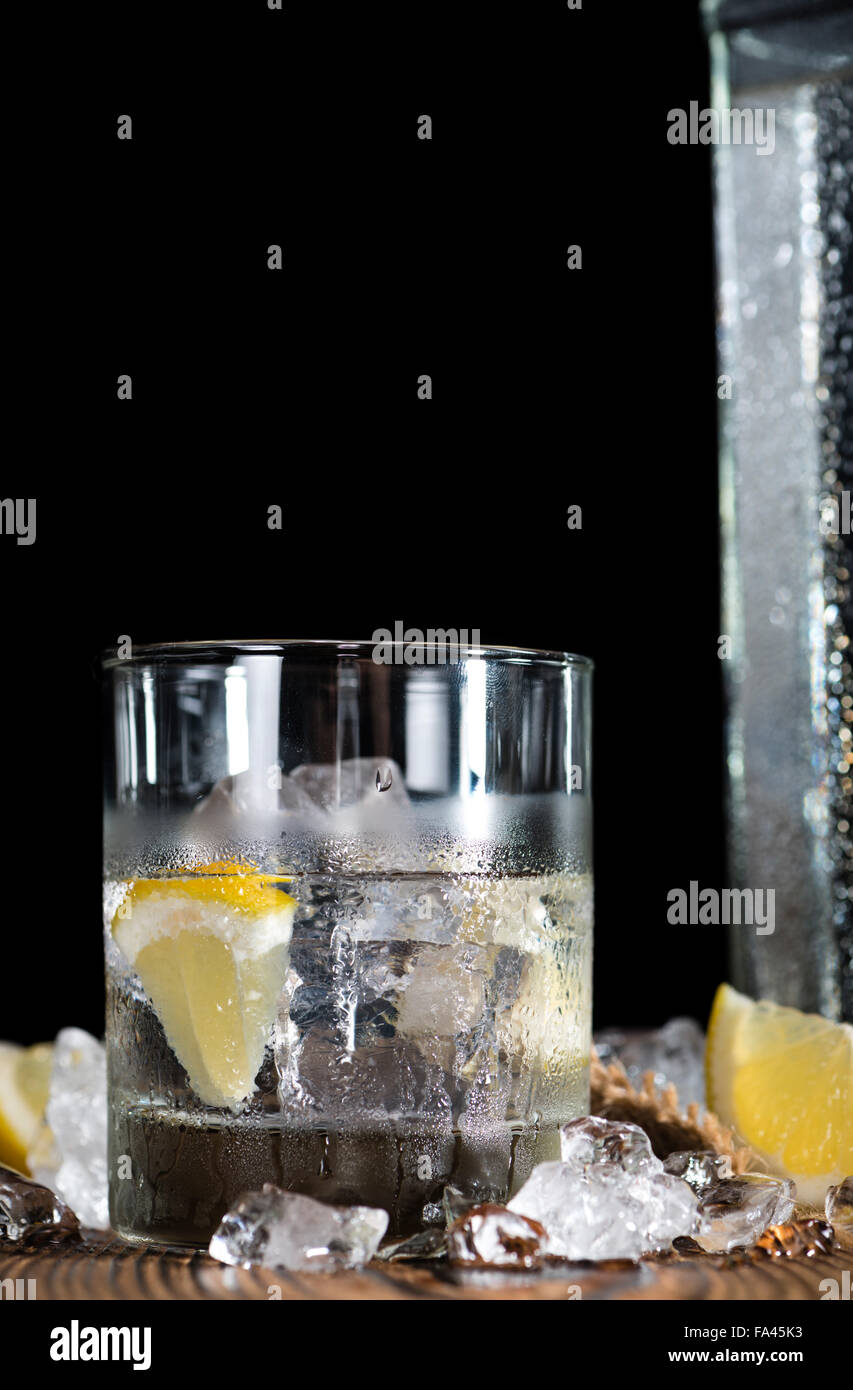 Shot of ice cold Vodka on rustic wooden background Stock Photo - Alamy