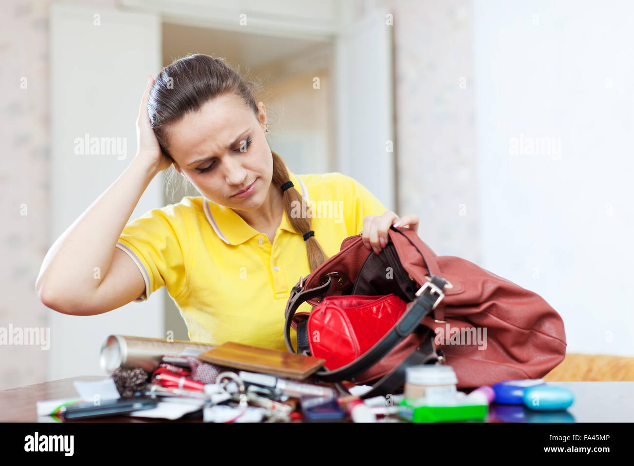 Find finding in purse hi-res stock photography and images - Alamy