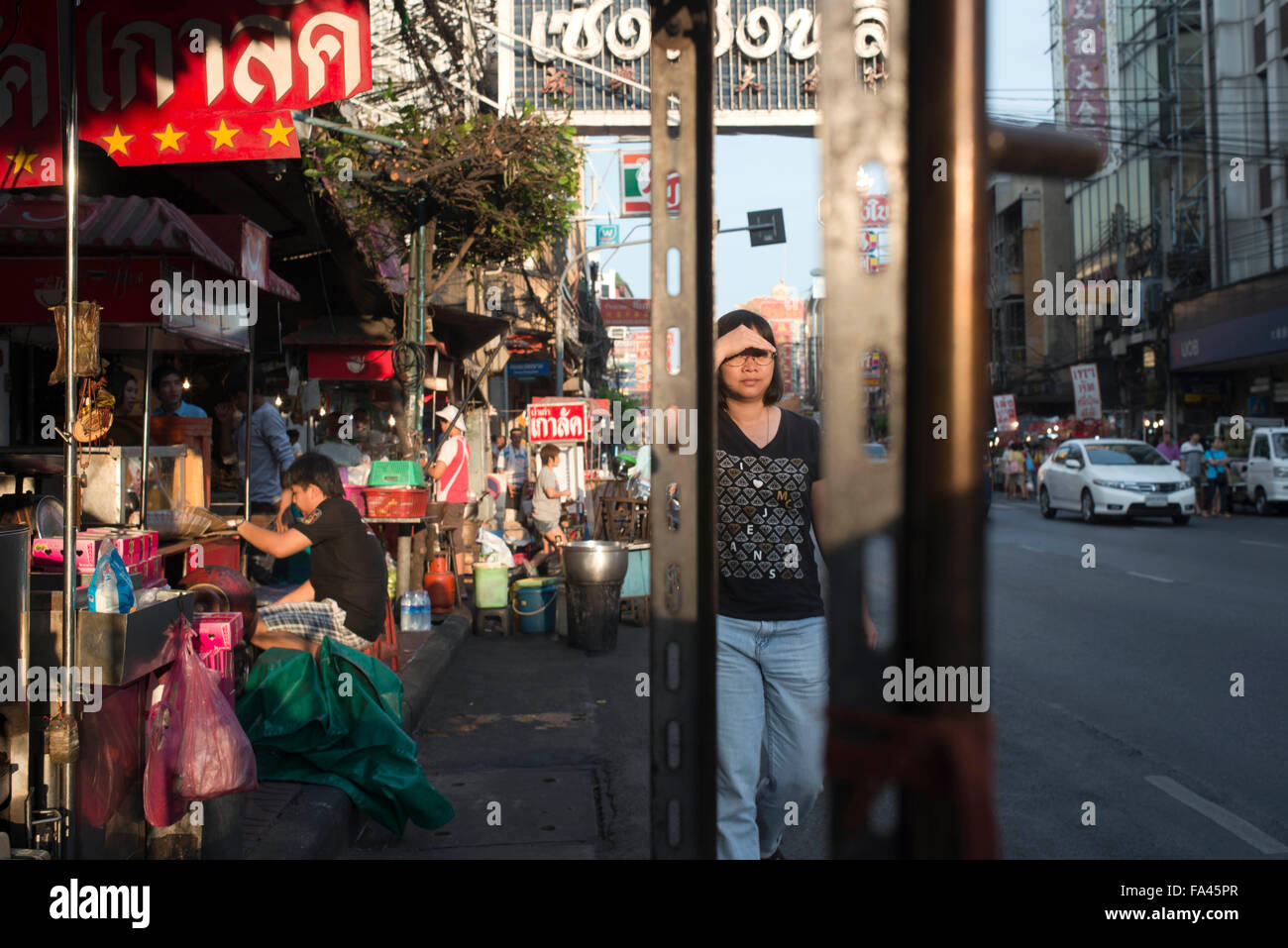 Thanon Yaowarat road at sunset in central Chinatown district of Bangkok Thailand. Yaowarat and ...