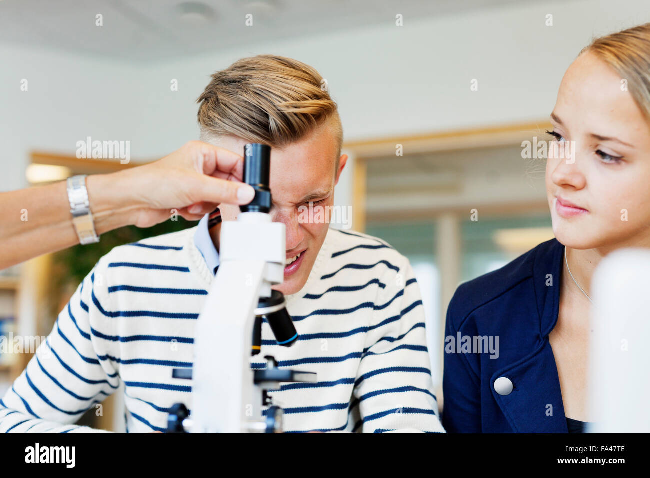 Multi ethnic student microscope hi-res stock photography and images - Alamy