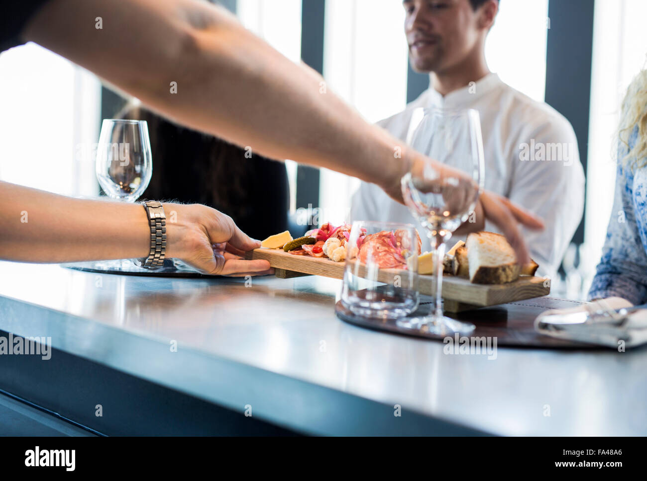 Waiter serving indian food hi-res stock photography and images - Alamy