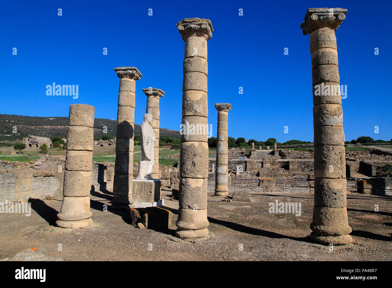 Statue of Emperor Trajan in the forum, Baelo Claudia Roman site, Cadiz ...