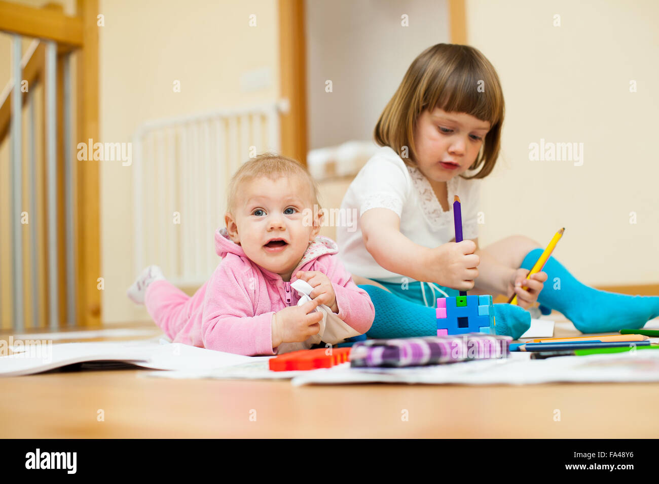 Happy children plays in home interior Stock Photo - Alamy