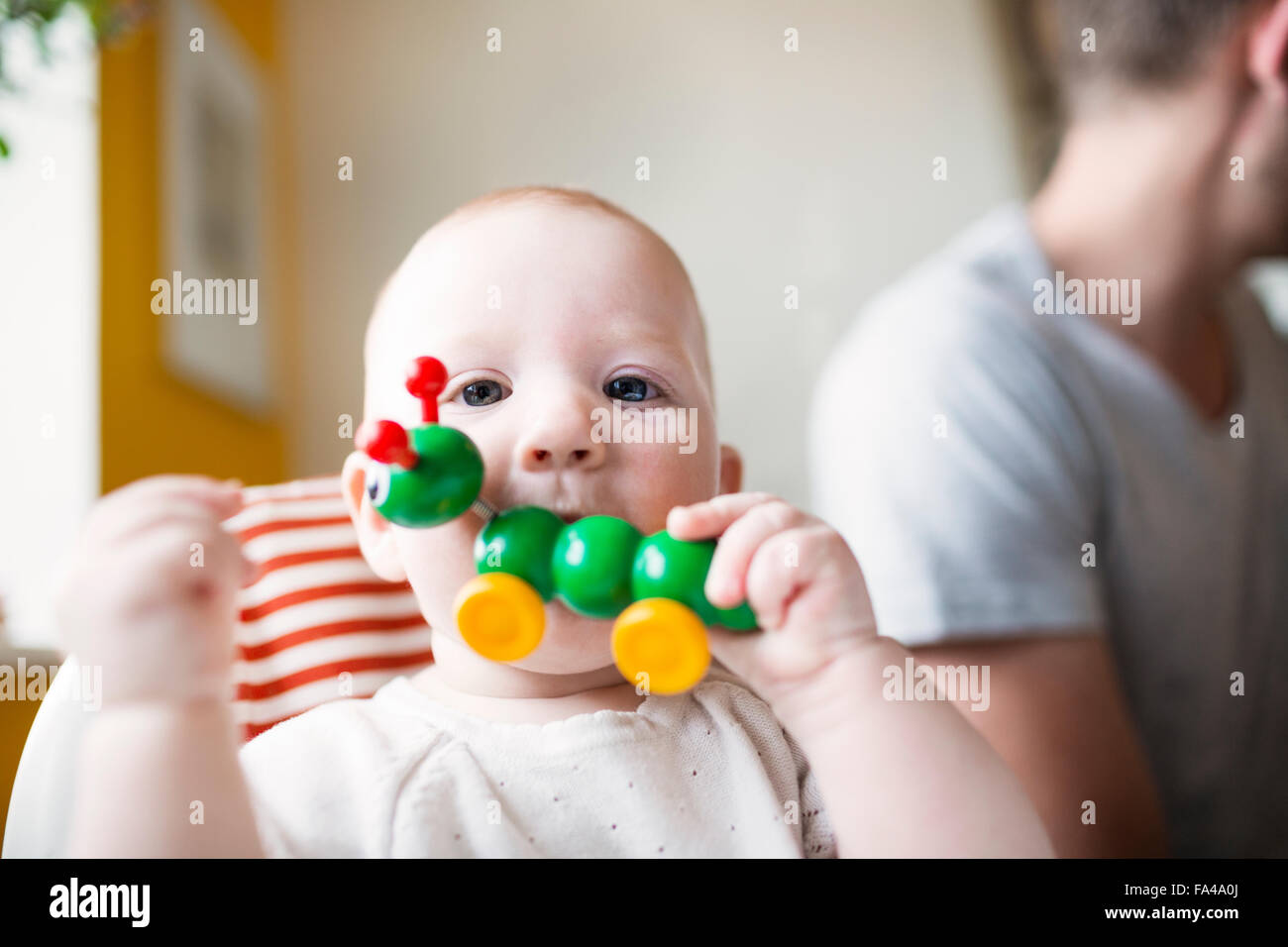 Baby biting toy hi-res stock photography and images - Alamy