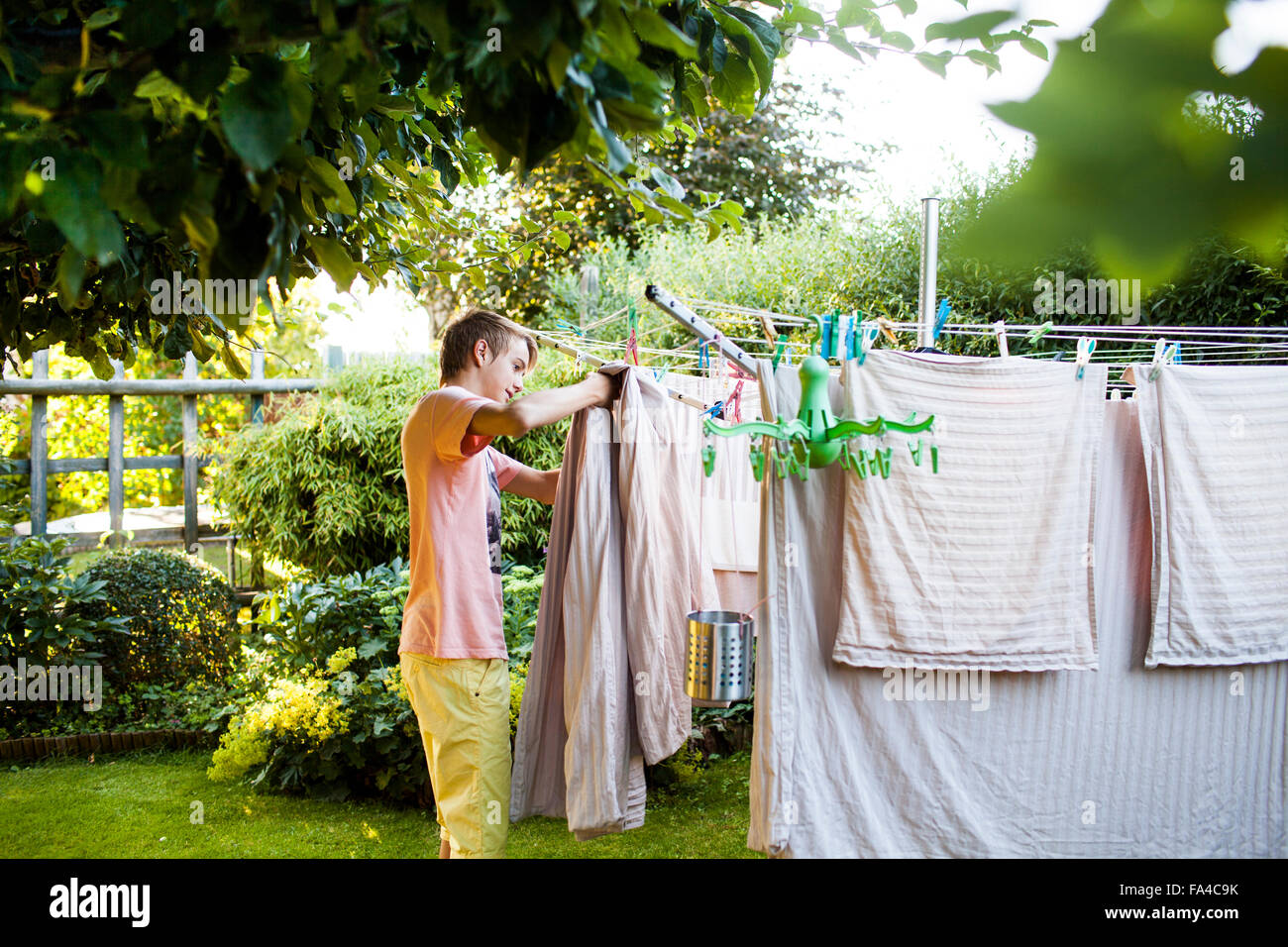 Boys doing yard work hi-res stock photography and images - Alamy